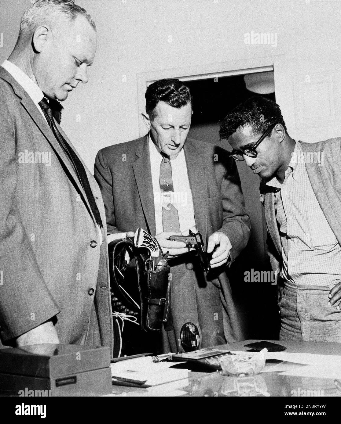 Entertainer Sammy Davis Jr., right, explains why he had guns in his ...