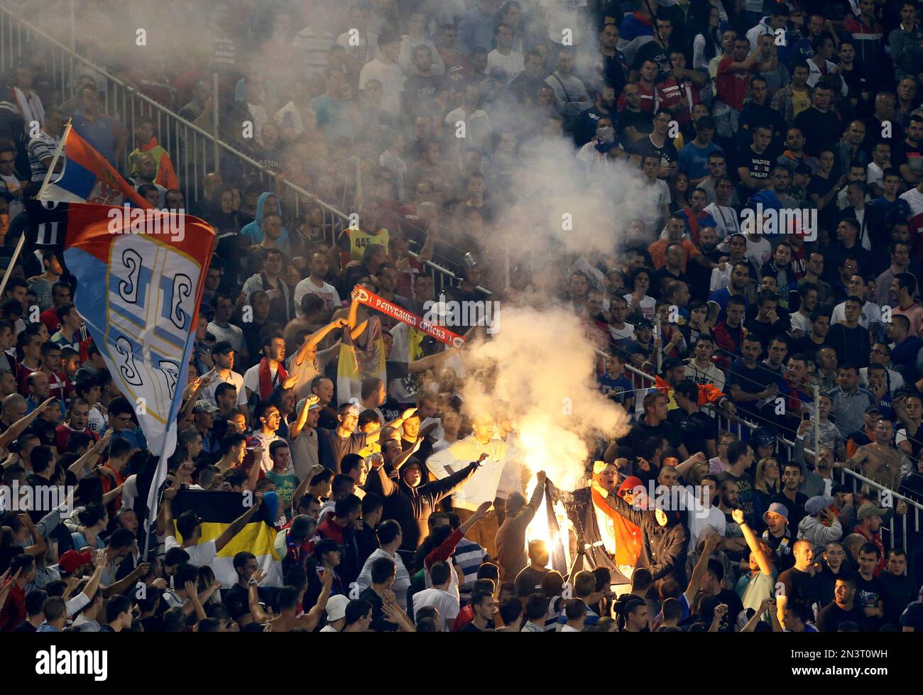Serbian soccer fans fans burn NATO flag during the Euro 2016 Group I ...