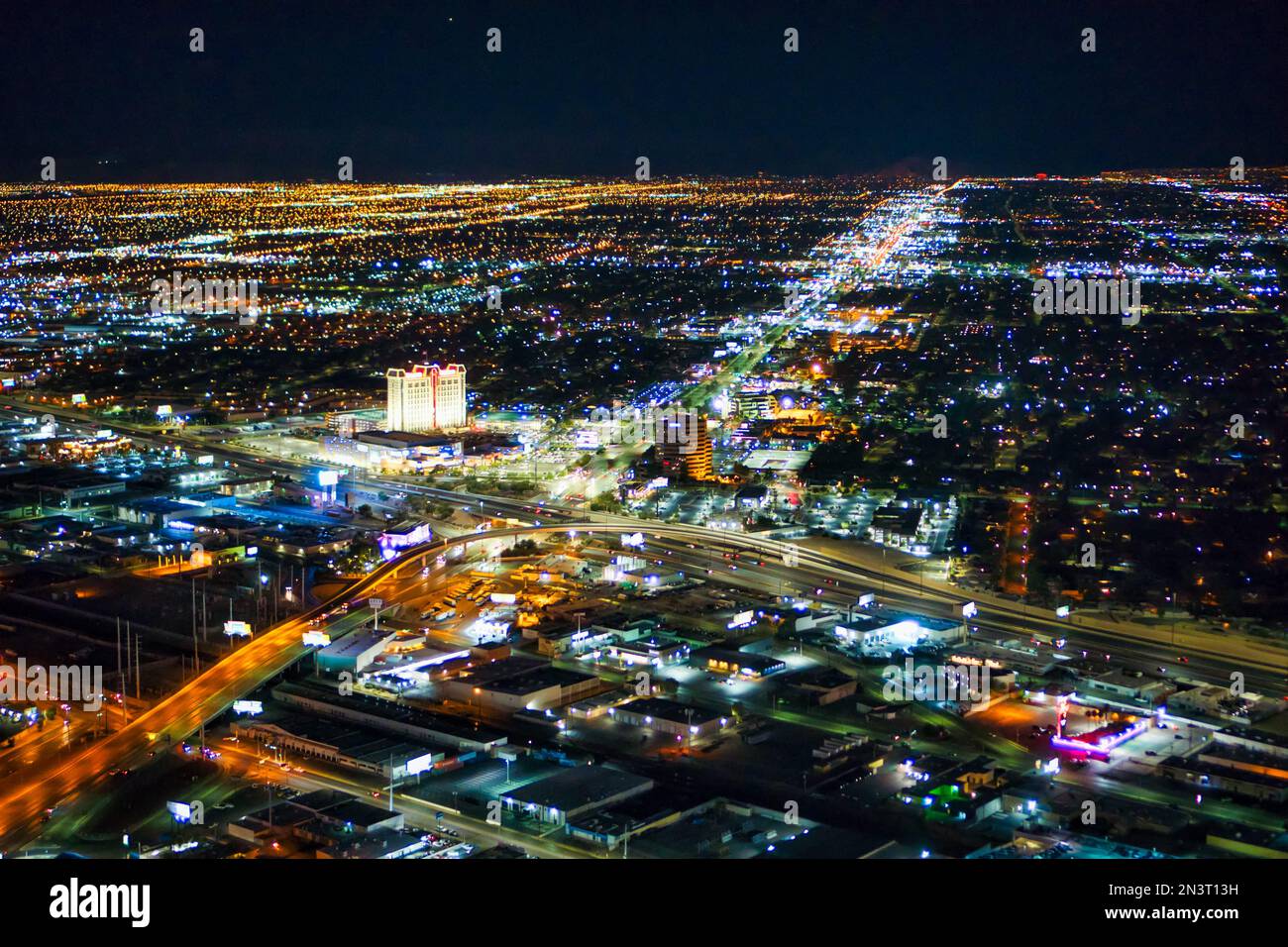 An aerial of the street lights of the cityscape of Las Vegas at night ...