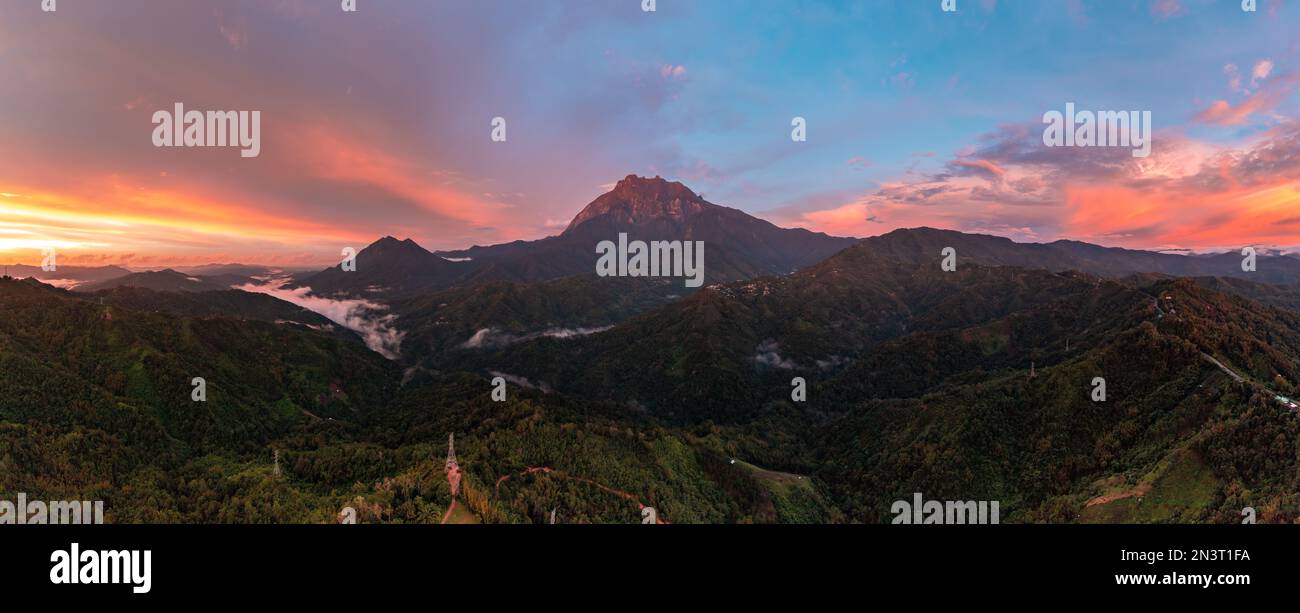 Majestic panoramic Mount Kinabalu shining golden during Sunset from ...