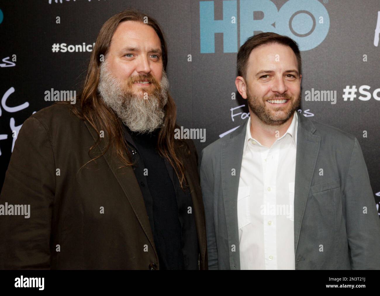 James A. Rota, left, and John Ramsay, right, attend the premiere of HBO ...