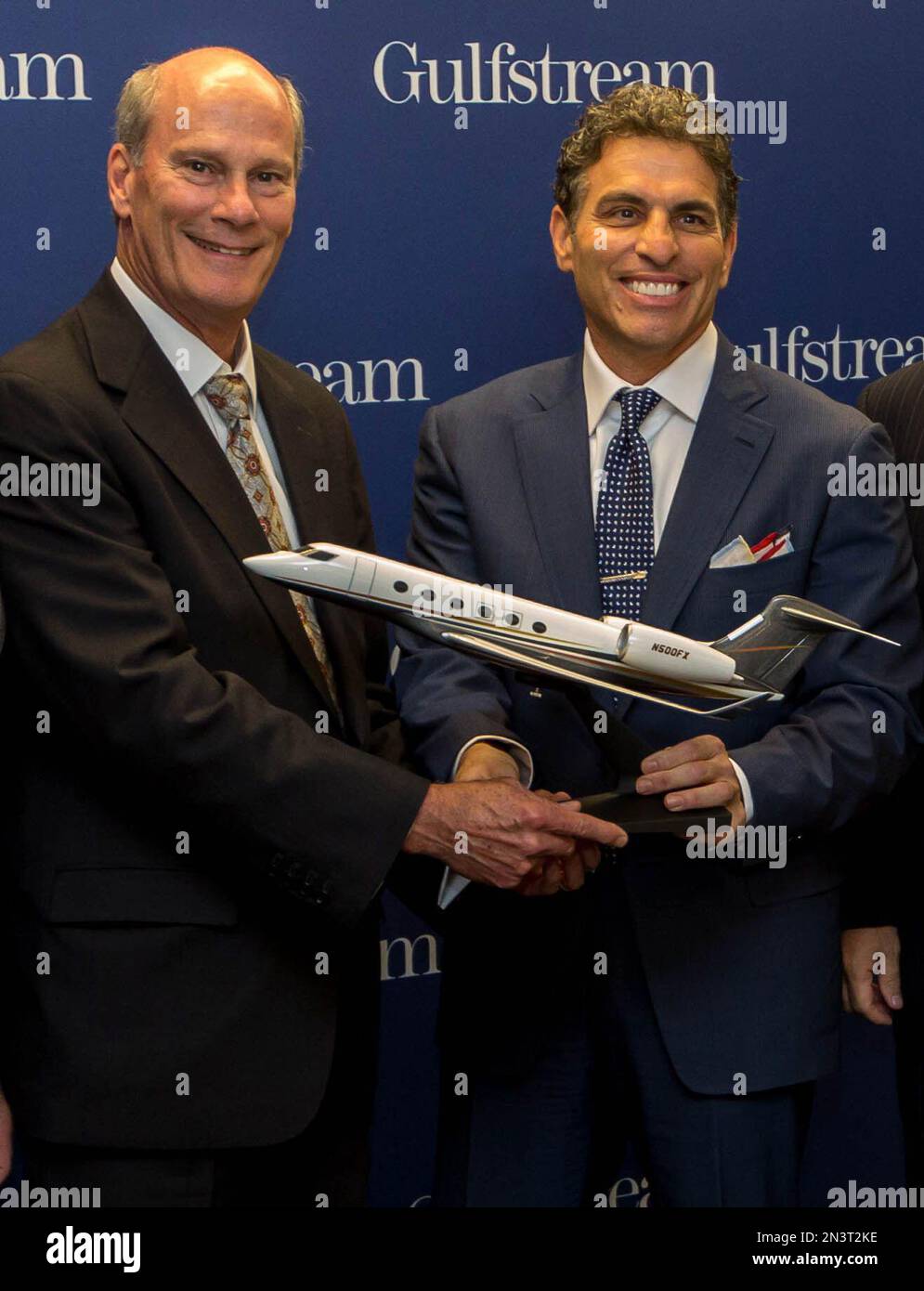Larry Flynn, President Gulfstream Aerospace, presents Flexjet chairman ...