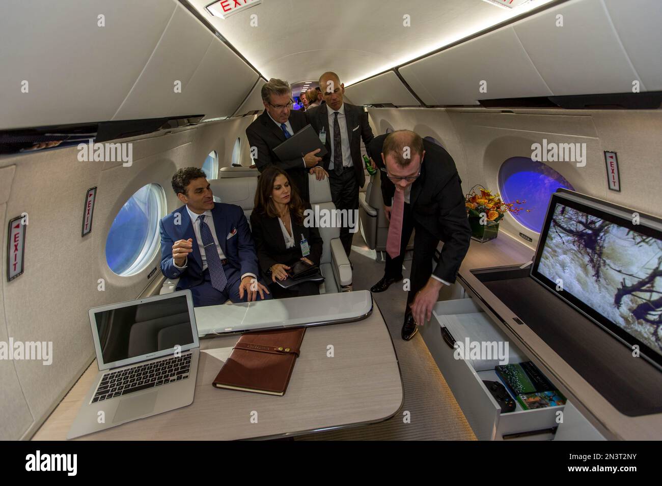 Flexjet Chairman Kenn Ricci, his executive team and his wife get a feel ...