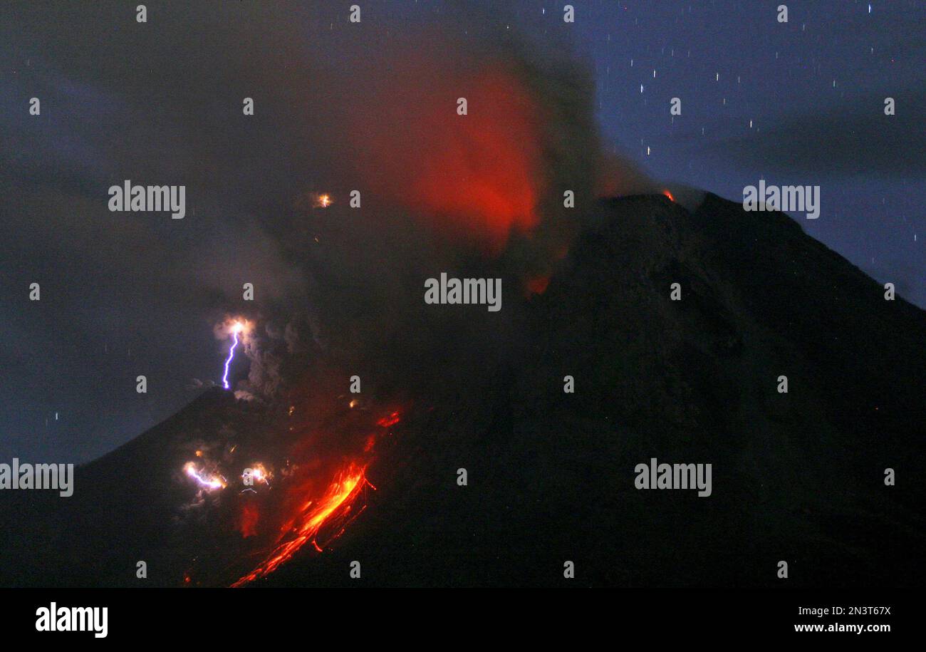 In this late Monday, Oct. 13, 2014 photo made with a slow shutter speed ...