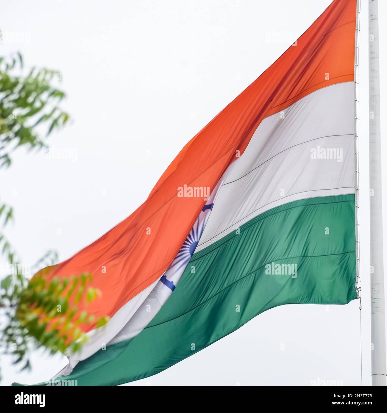 India flag flying high at Connaught Place with pride in blue sky, India ...