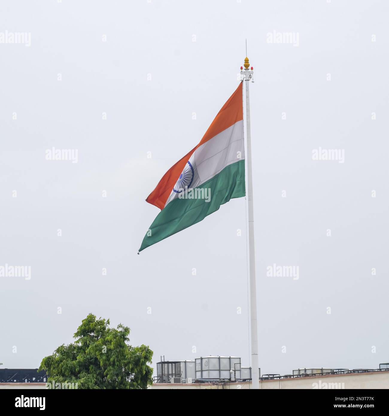 India flag flying high at Connaught Place with pride in blue sky, India ...