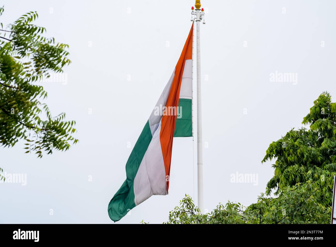 India flag flying high at Connaught Place with pride in blue sky, India ...