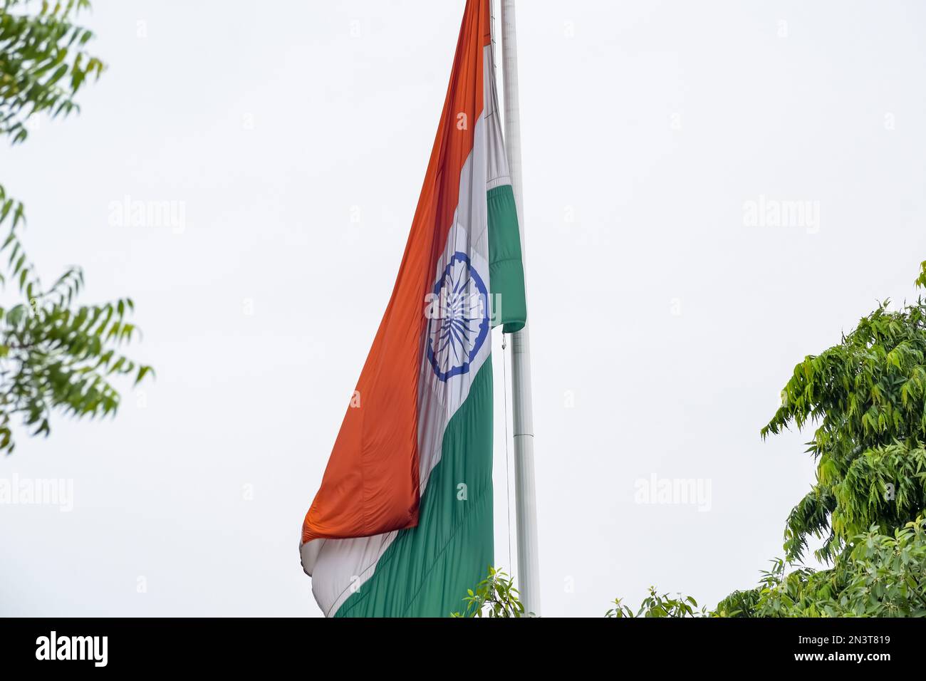 India flag flying high at Connaught Place with pride in blue sky, India ...
