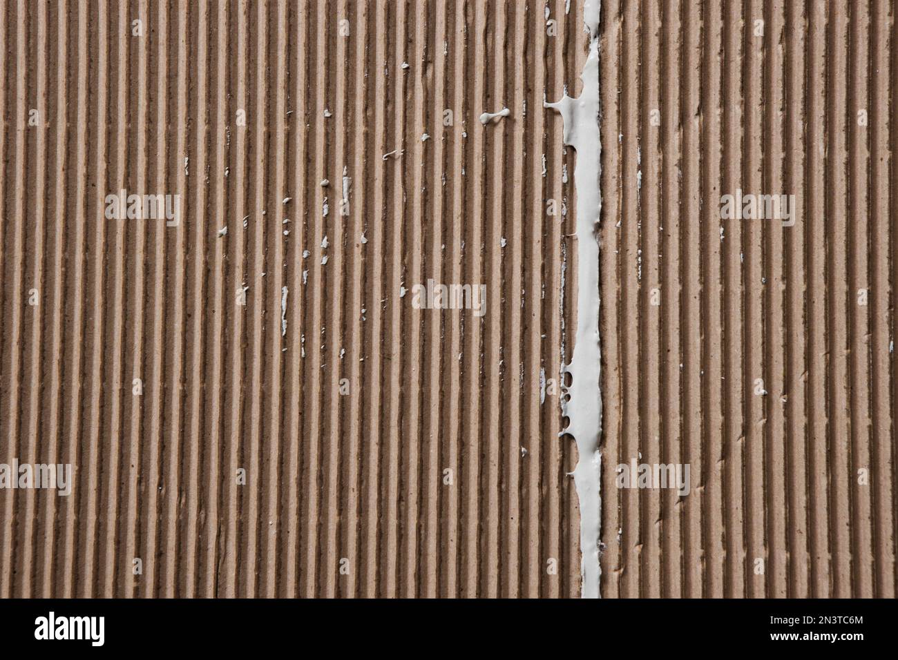 Background of cardboard texture with white plaster Stock Photo - Alamy