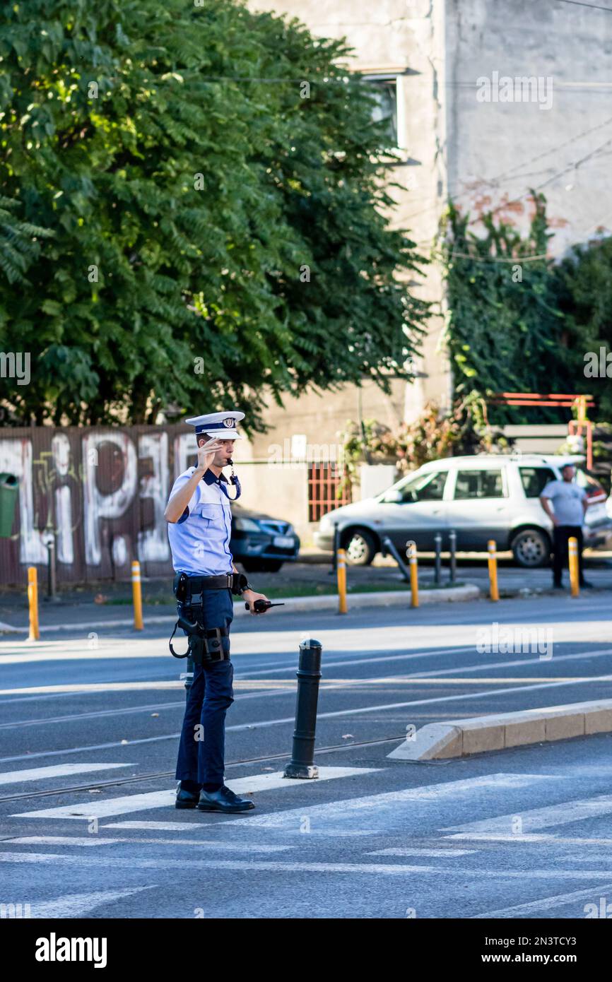 Police agent, Romanian Traffic Police (Politia Rutiera) directing ...