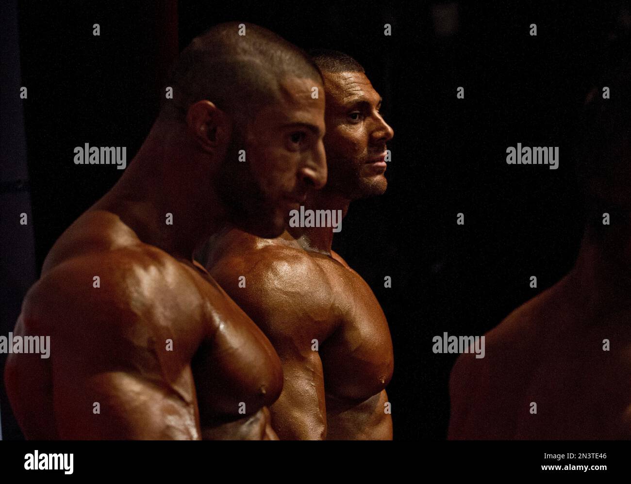 Competitors await judges to announce the winner during the Kosovo ...