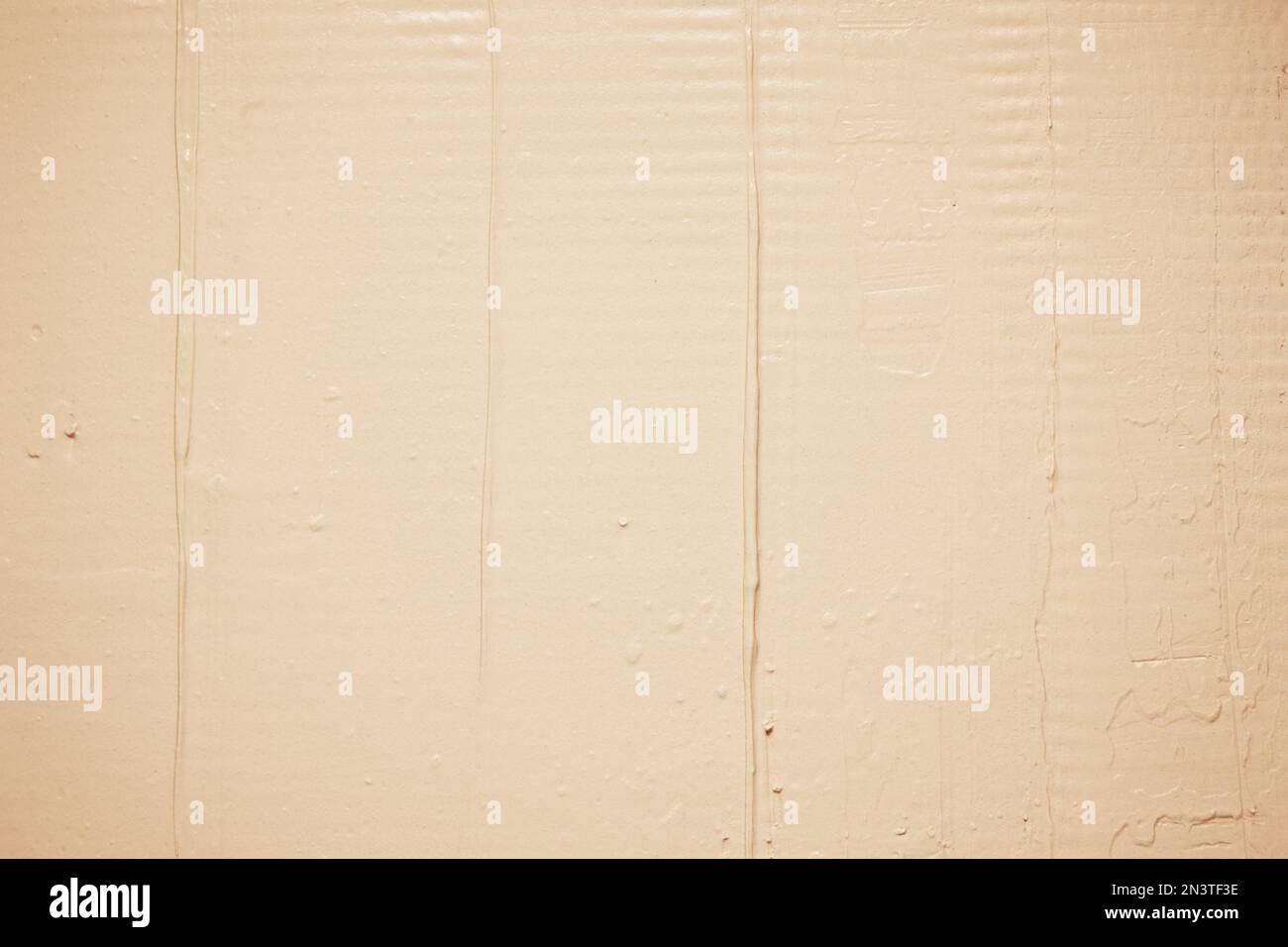 Decorative beige plaster wall, rough surface. Pastel color background ...