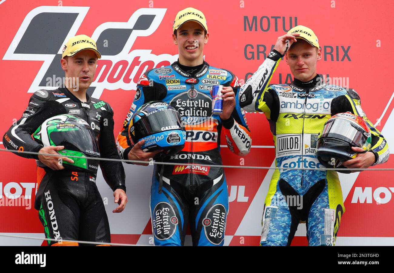Moto3 winner Alex Marquez, center, second-placed Efren Vazquez, left ...
