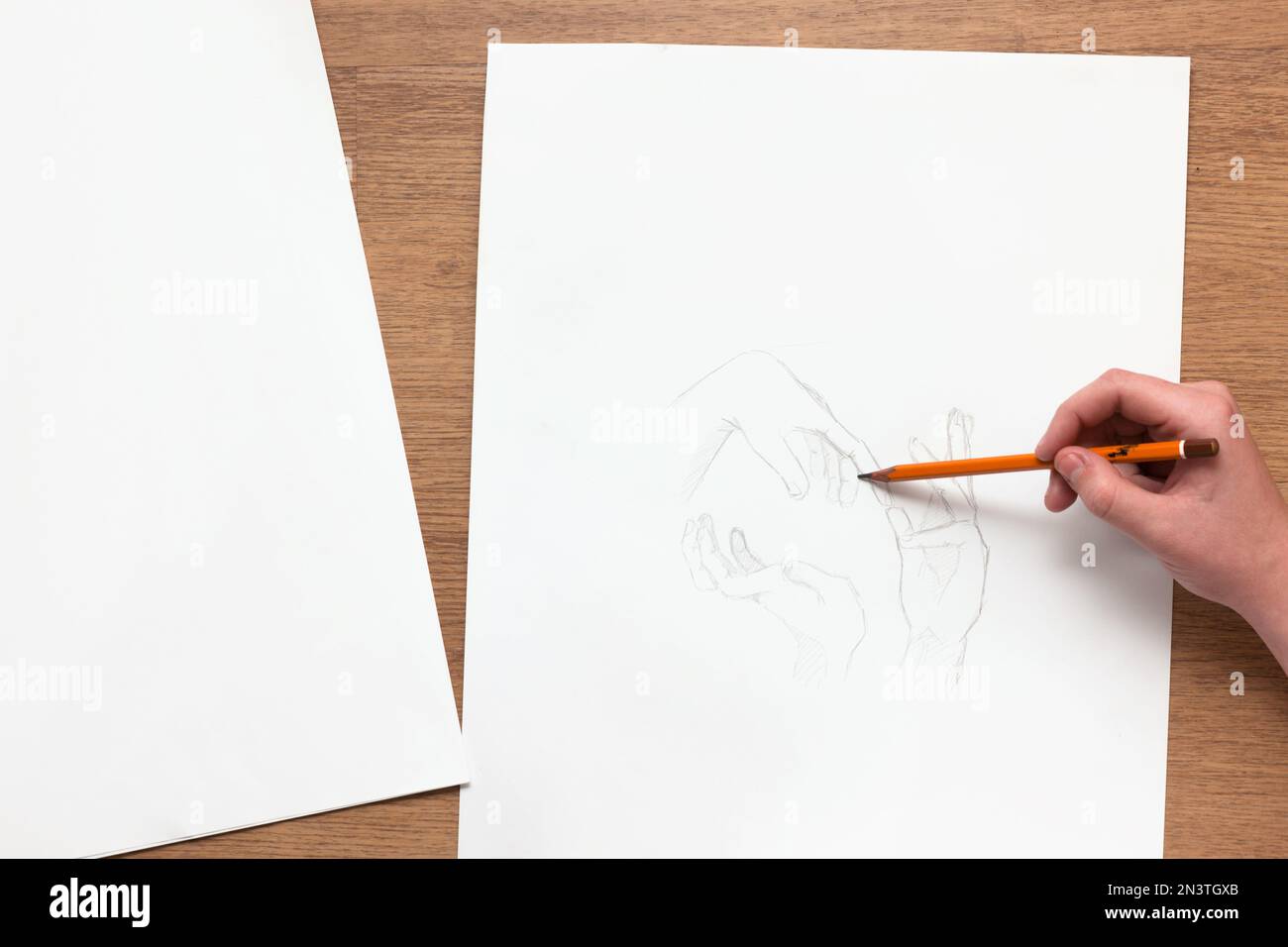 Unrecognizable painter draws hands hi-res stock photography and images ...