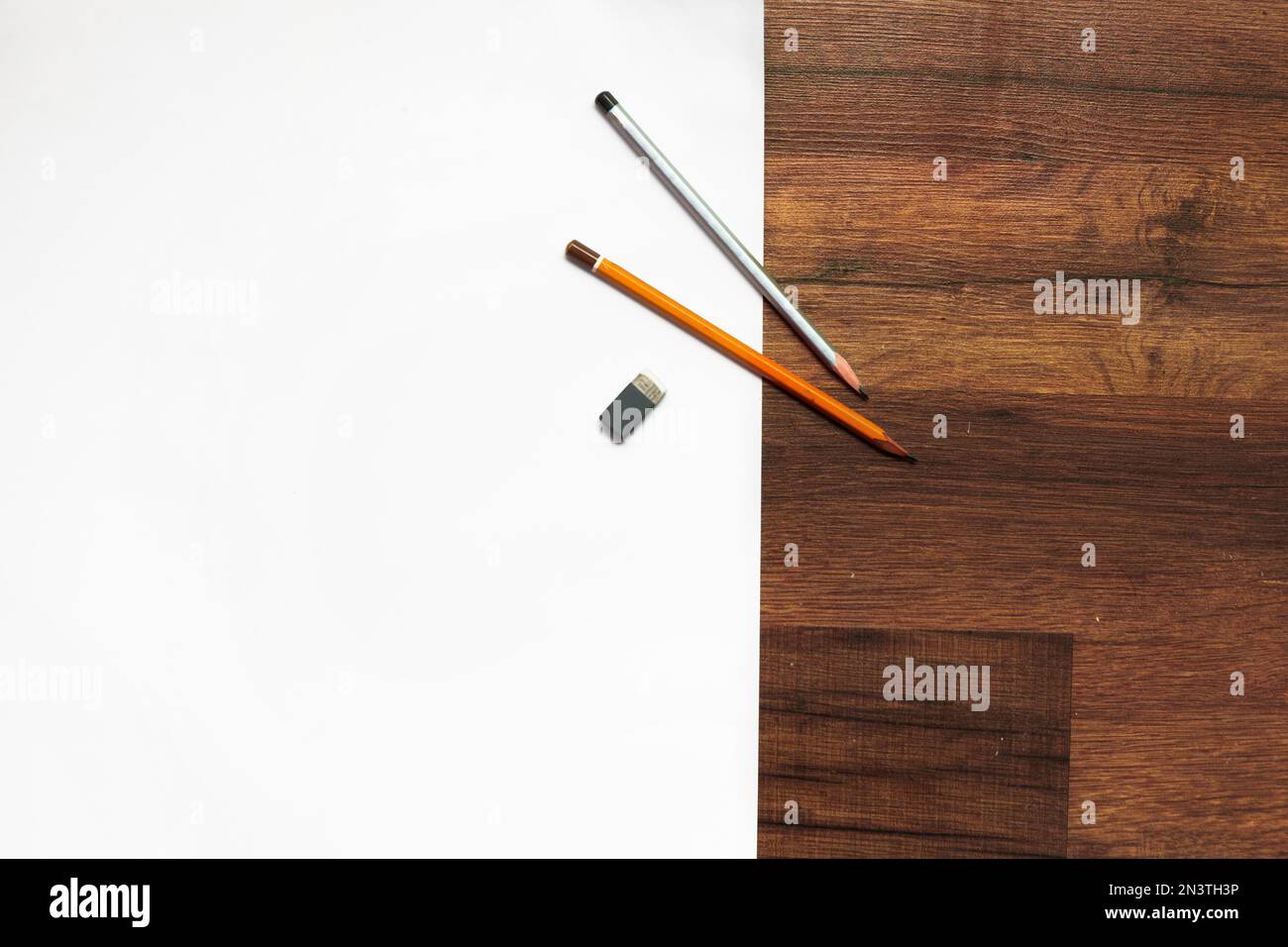 Pencils on blank paper. Drawing background Stock Photo - Alamy