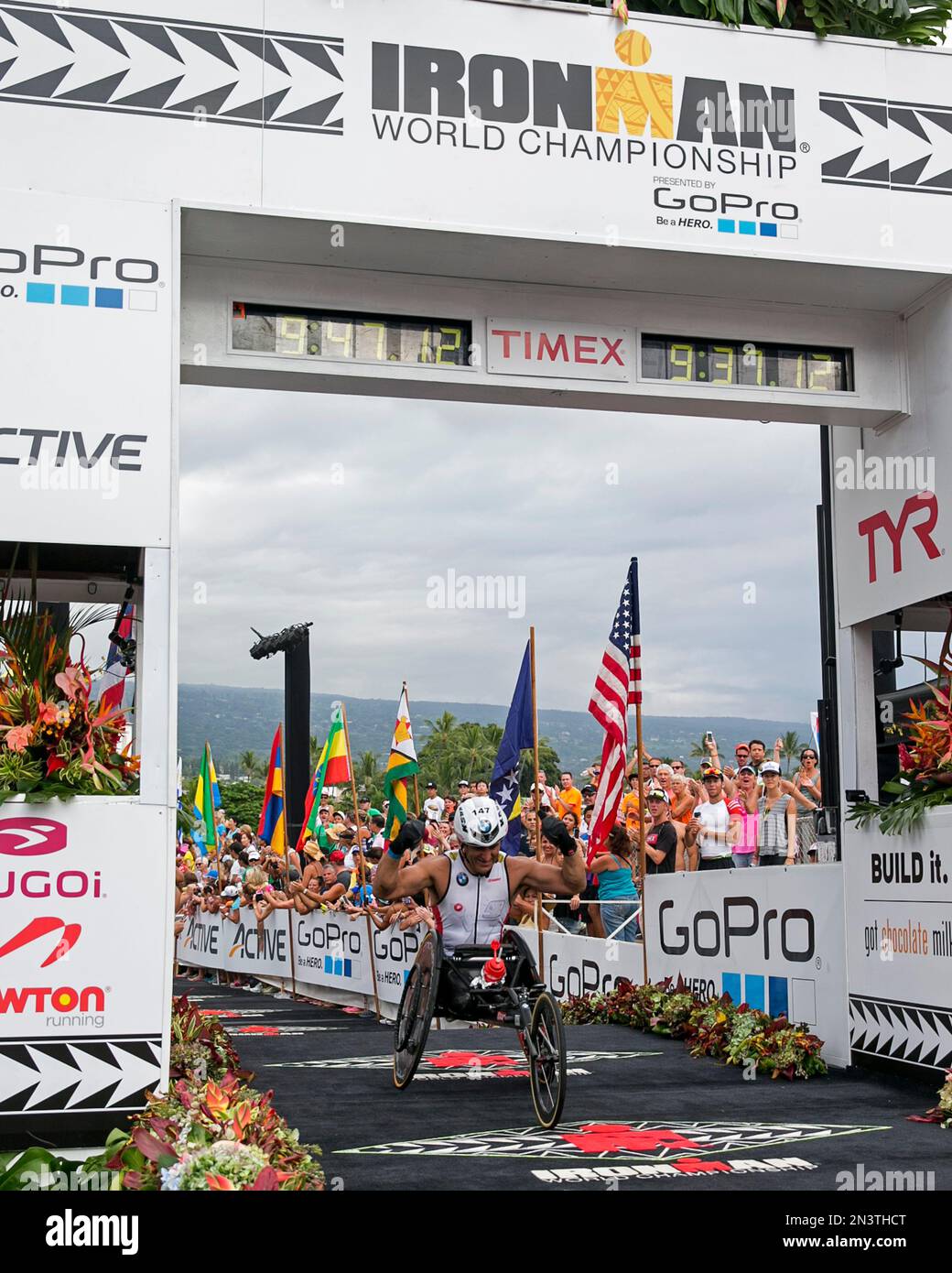 In this photo provided by the 2014 IRONMAN World Championship presented ...