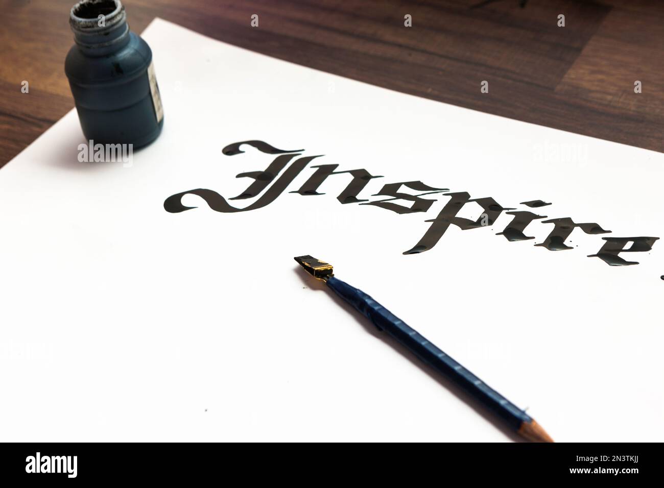 Writer's tools. Ink, paper, pen top view Stock Photo - Alamy