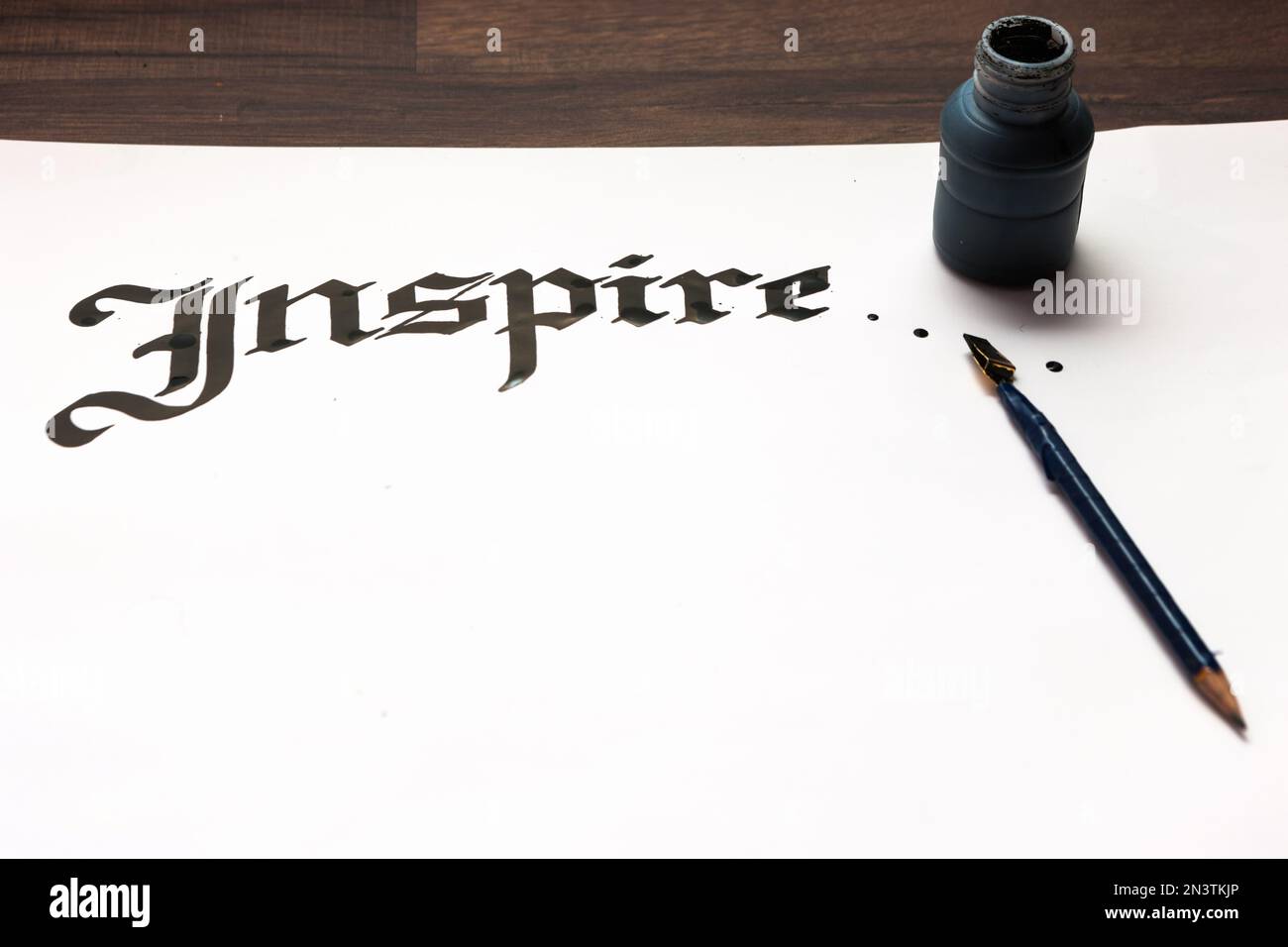 Inspiration calligraphy lettering background Stock Photo - Alamy