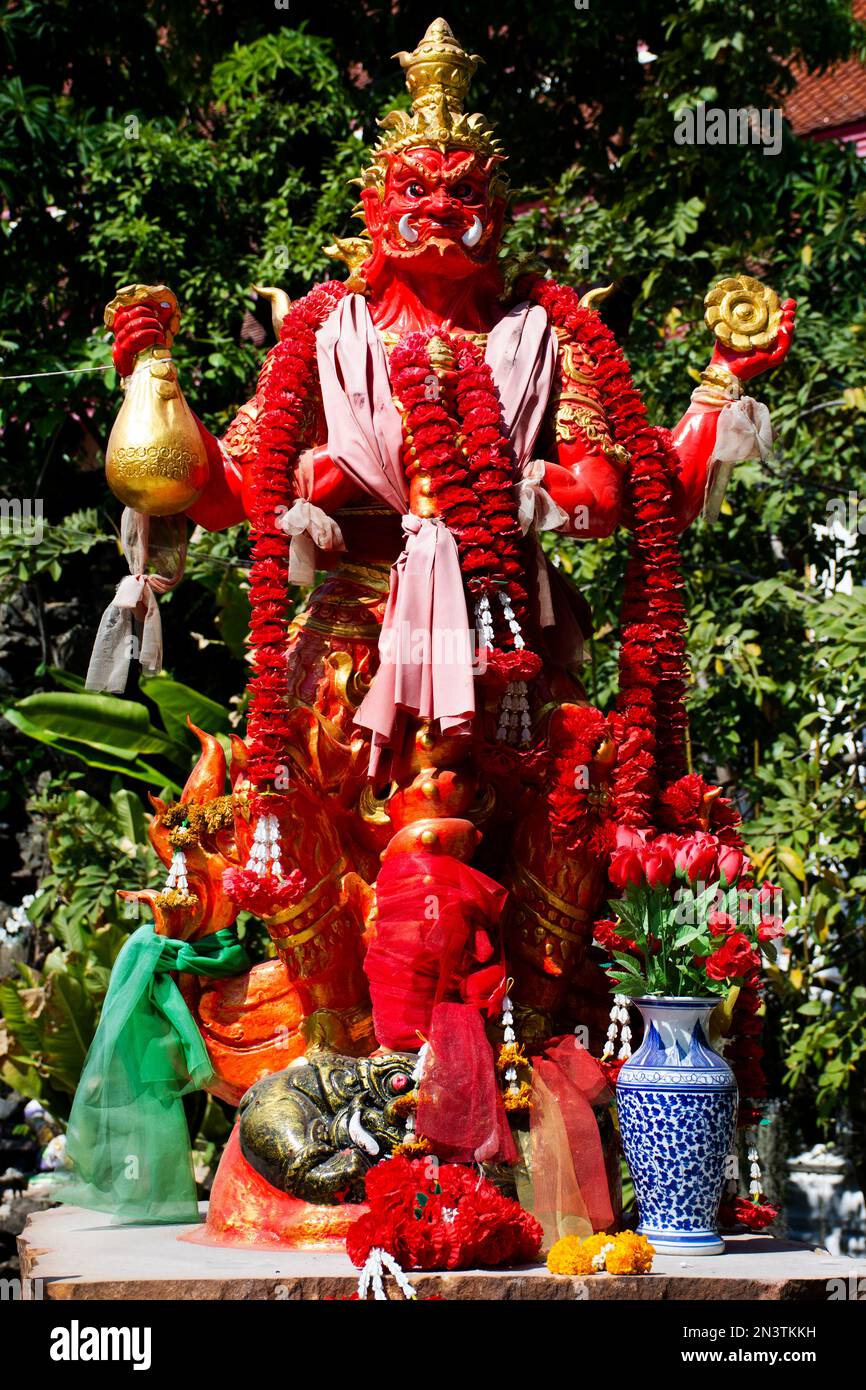 Ancient King Thao Wessuwan or antique Vasavana Kuvera giant statue thai ...