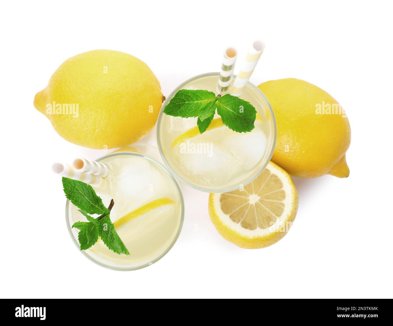 Natural lemonade with mint and fresh fruits on white background, top ...