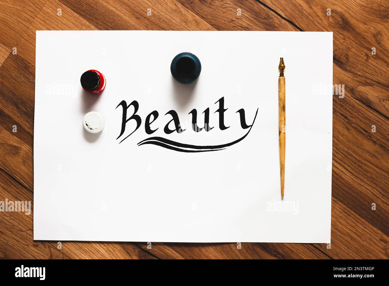Calligraphy Beauty word background Stock Photo - Alamy