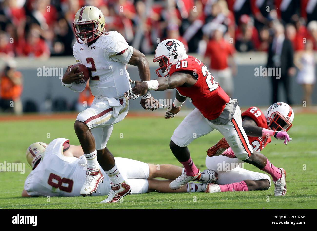 Boston College quarterback Tyler Murphy (2) runs as North Carolina ...