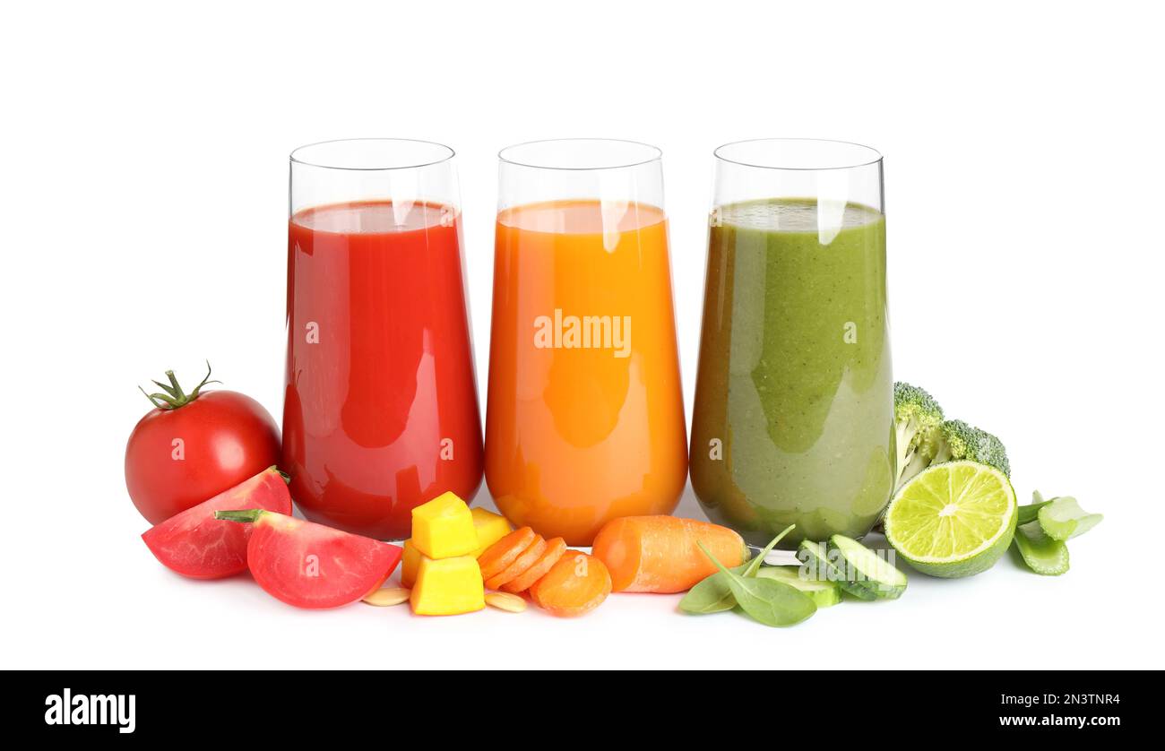 Different tasty juices and fresh ingredients on white background Stock ...
