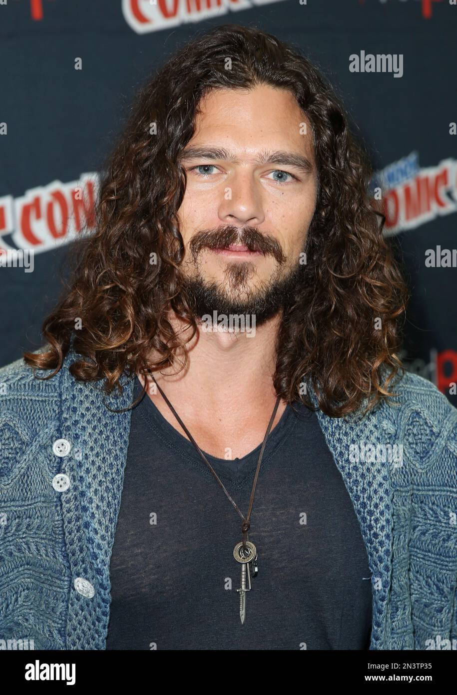 Luke Arnold, from the STARZ original series "Black Sails", poses for a ...
