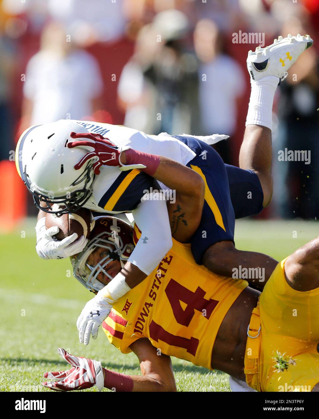 Toledo wide receiver Kishon Wilcher (6) is tackled by Iowa State ...