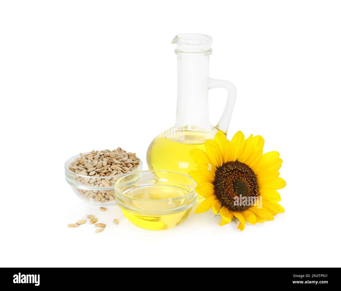 Sunflower, oil and seeds on white background Stock Photo - Alamy