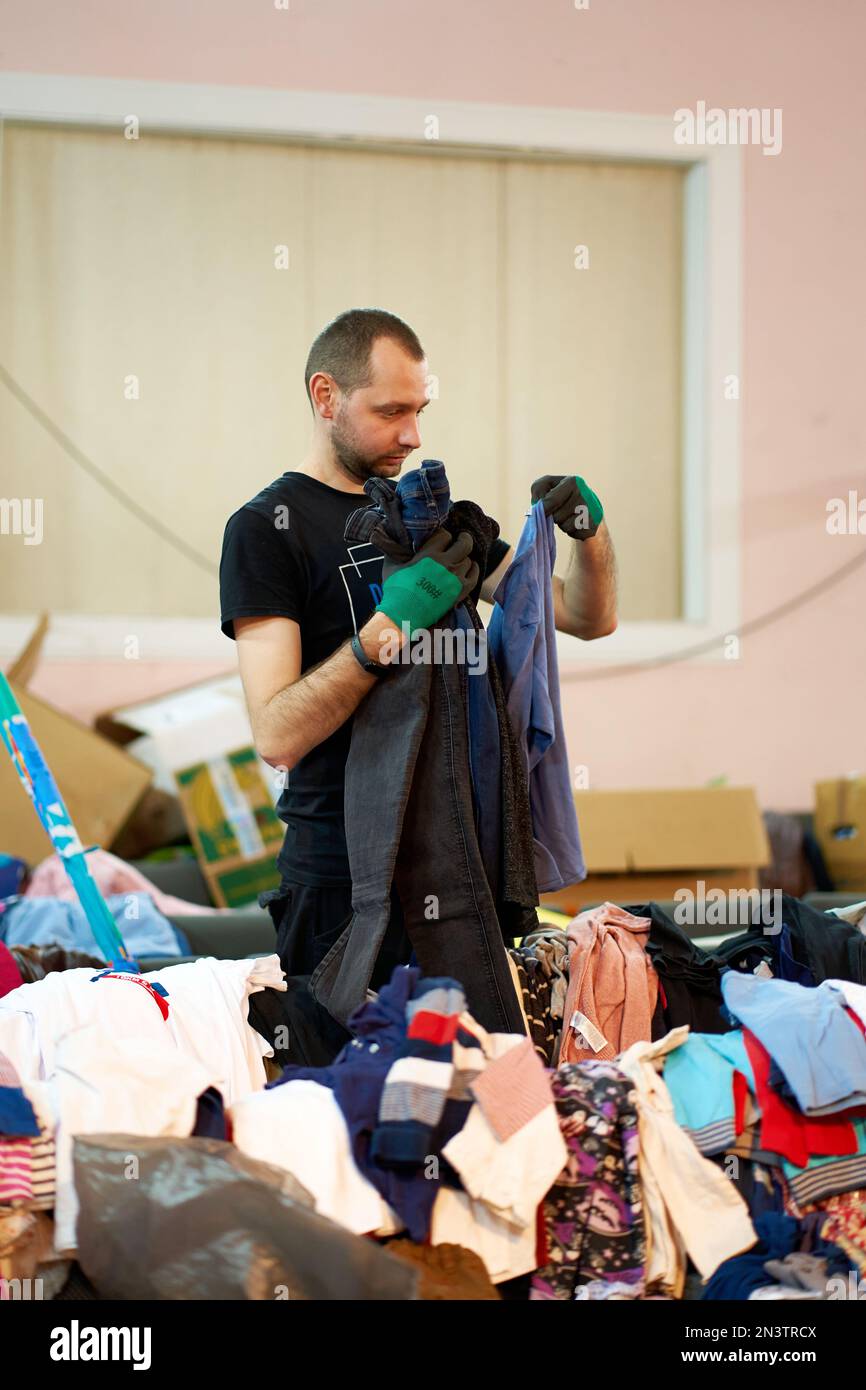 Man sorting wardrobe hi-res stock photography and images - Alamy