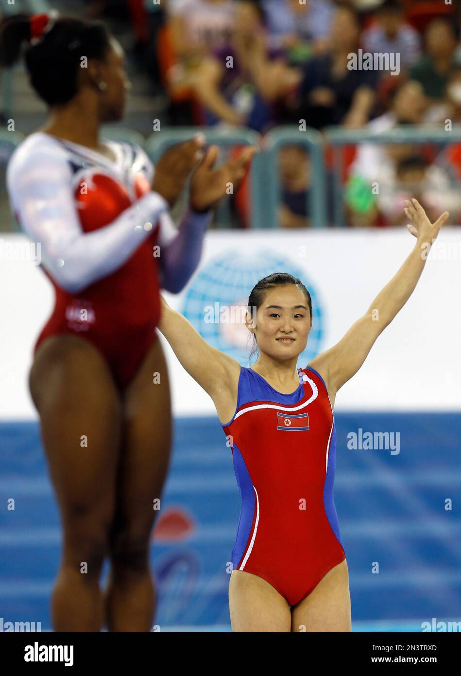 Gold medalist Hong Un Jong of North Korea, right, waves to spectators ...