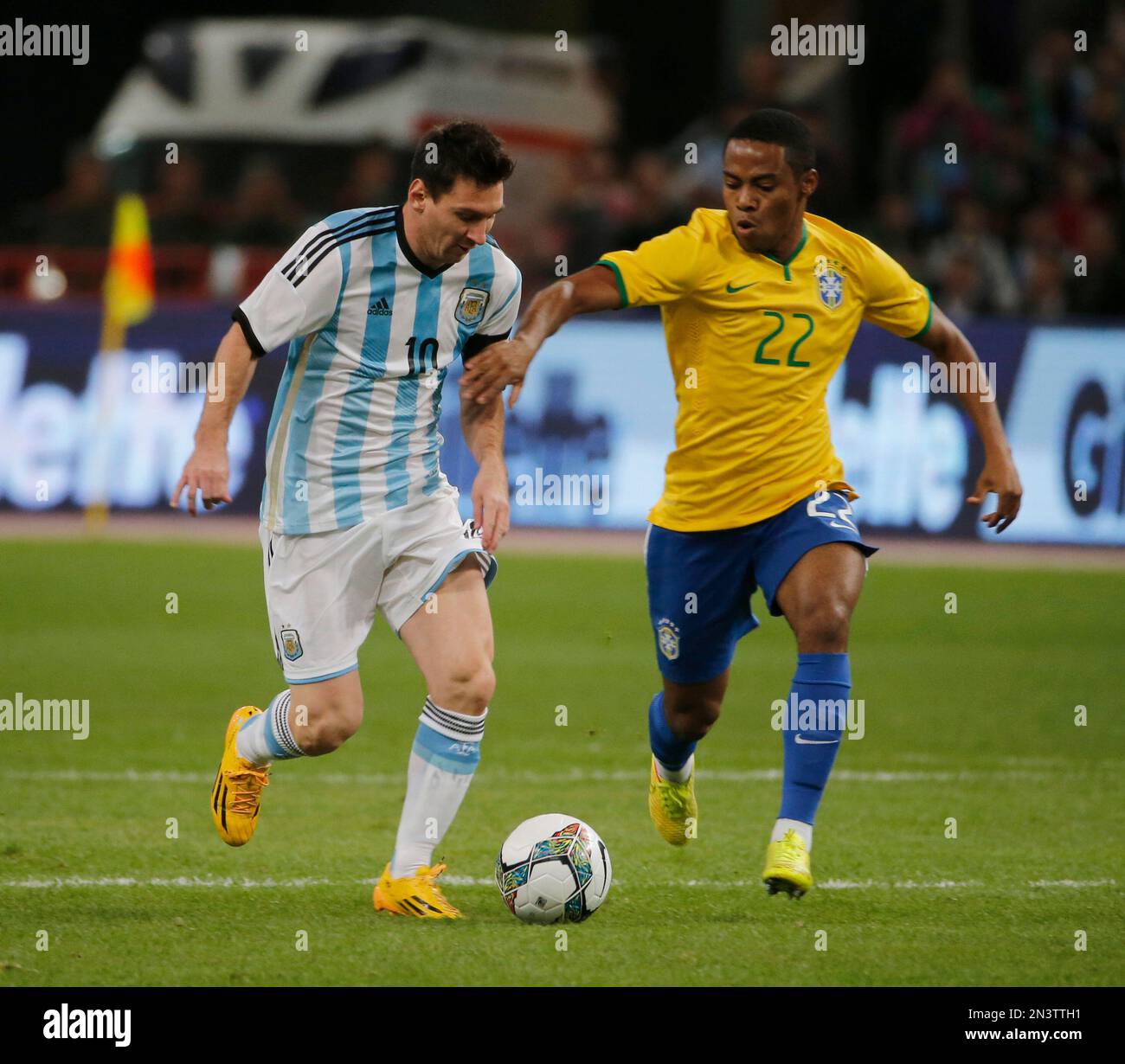 Argentina's Lionel Messi with Brazil's Elias during a Brazil vs ...