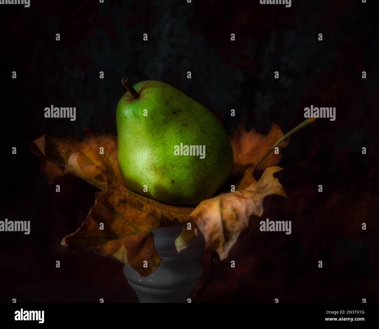 Still Life with Pear and Withered Maple Leaf Stock Photo - Alamy