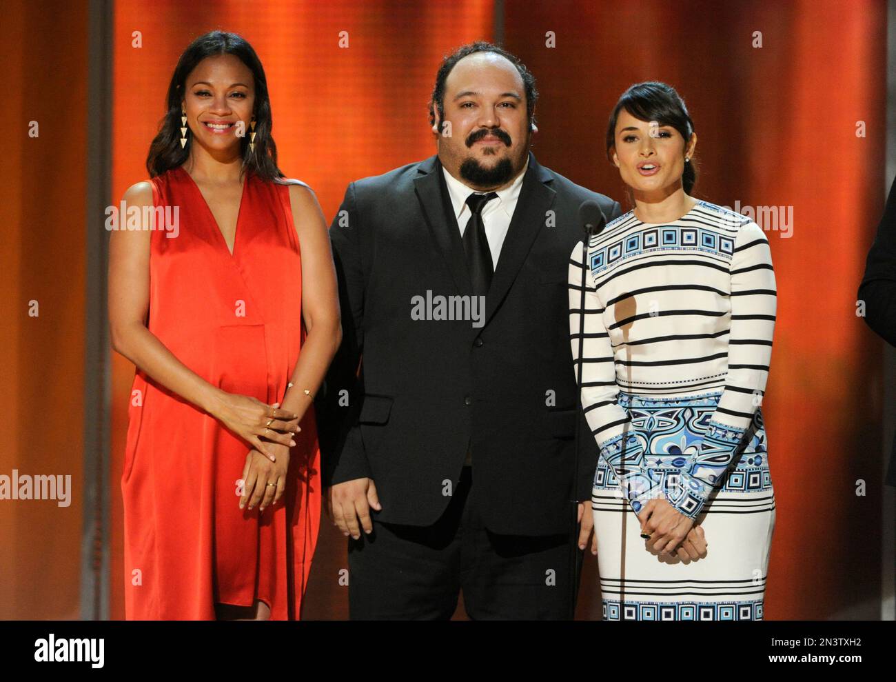 Zoe Saldana, and from left, Jorge R. Gutierrez and Mia Maestro speak on ...