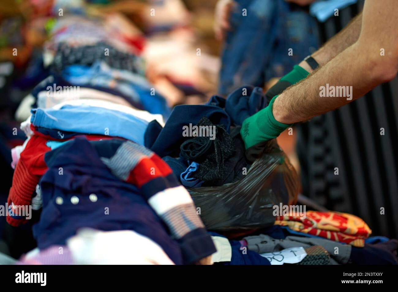 Poor hand sorting waste hi-res stock photography and images - Alamy