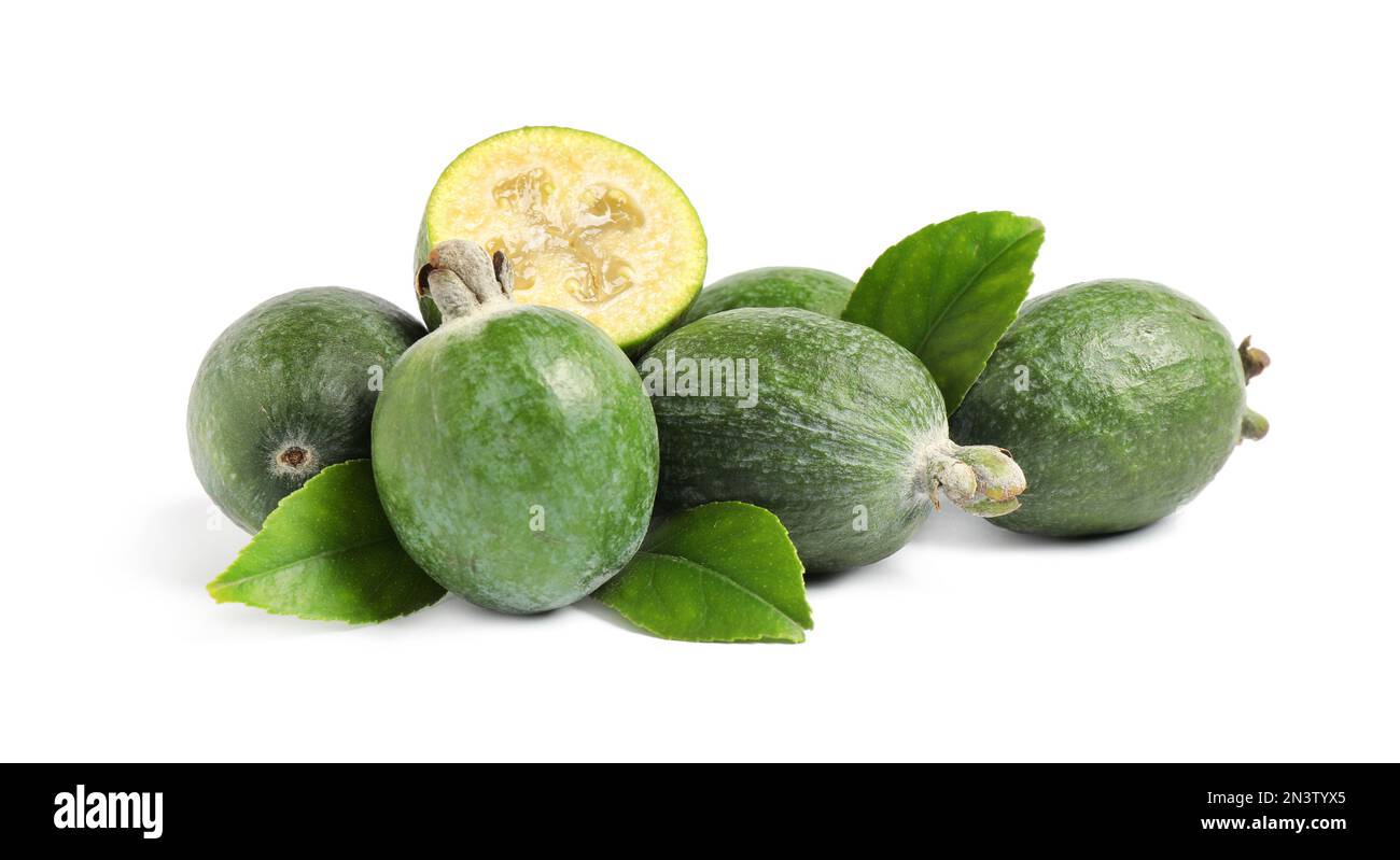 Pile of feijoas and leaves on white background Stock Photo - Alamy