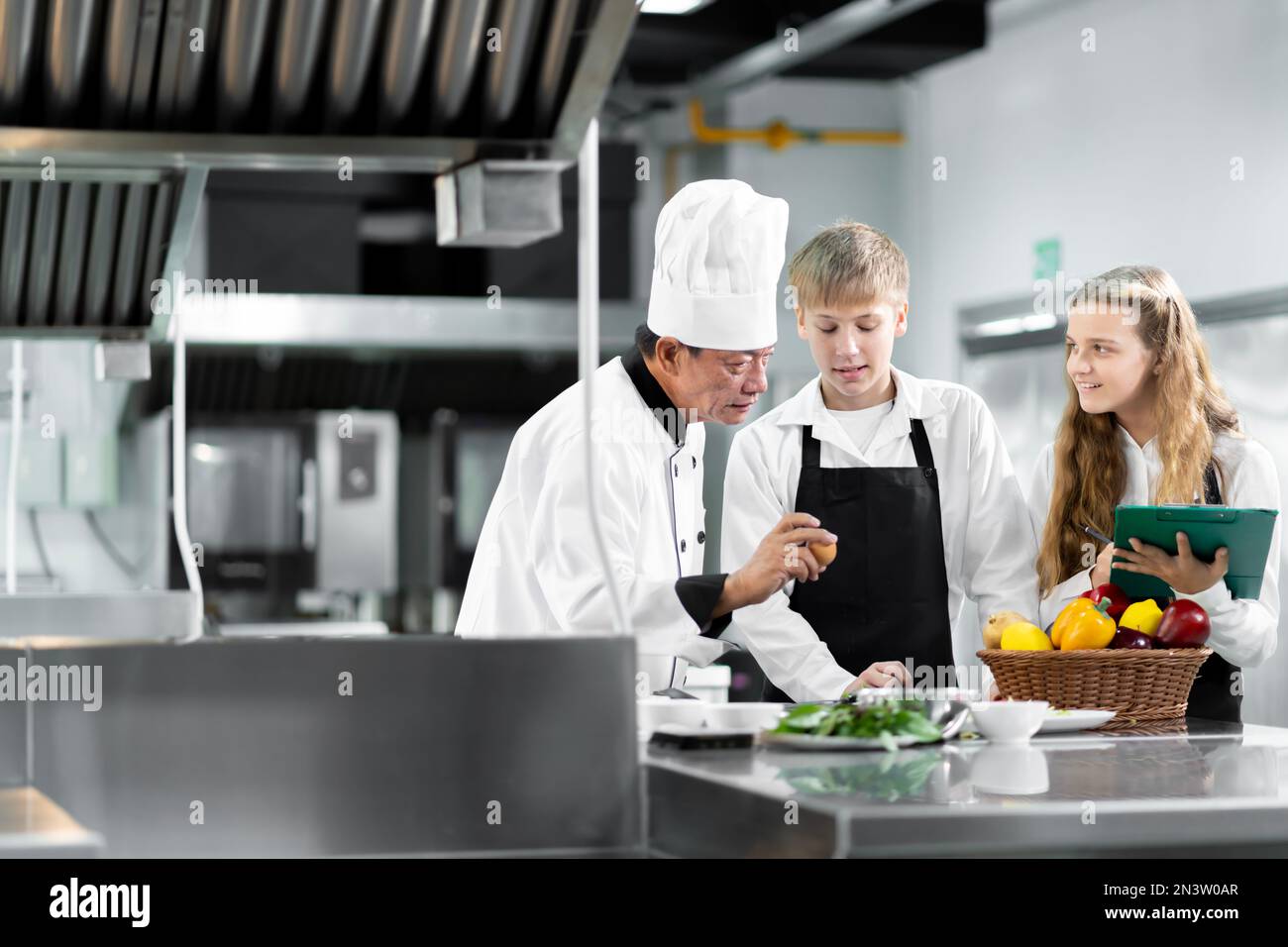 Professional chef teaching hi-res stock photography and images - Alamy