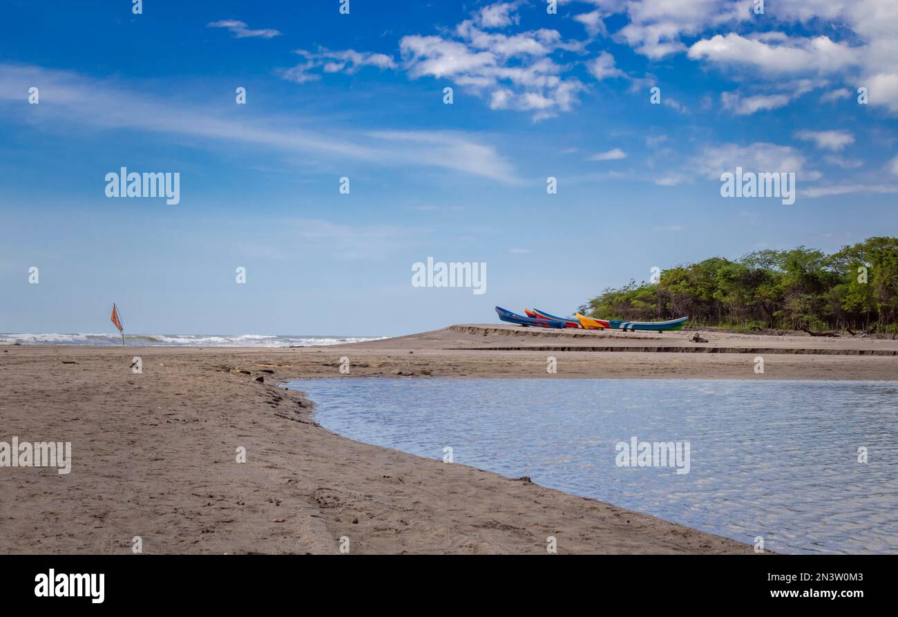Four boats parked on the sand, fishing boats parked near the ocean ...