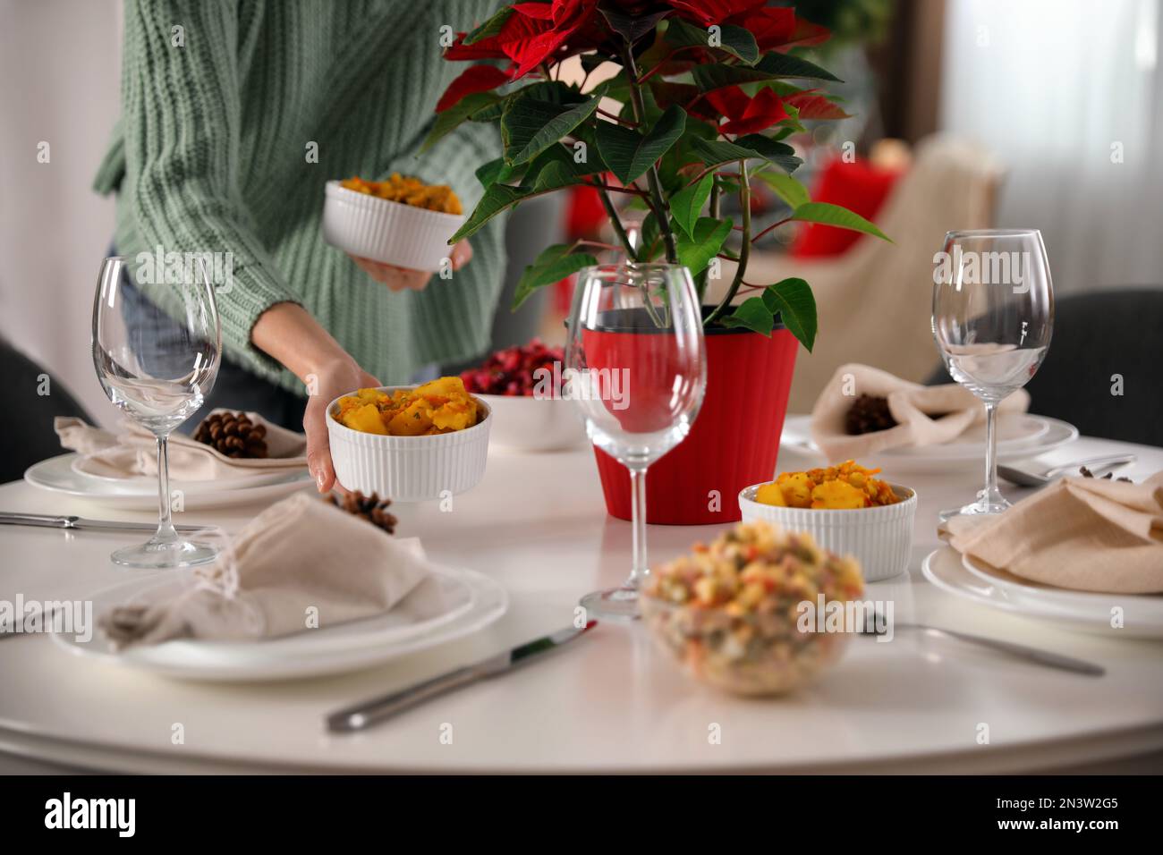 Preparing festive table setting hi-res stock photography and images - Alamy
