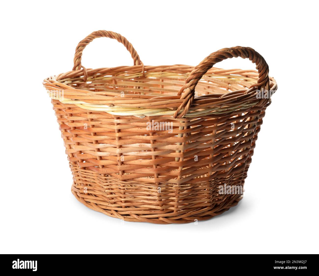 Wicker basket with handles isolated on white Stock Photo - Alamy