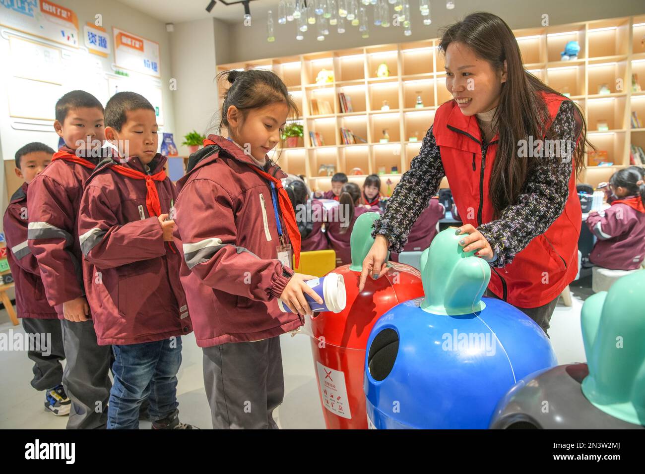 HUZHOU, CHINA - FEBRUARY 8, 2023 - Volunteers instruct primary school ...