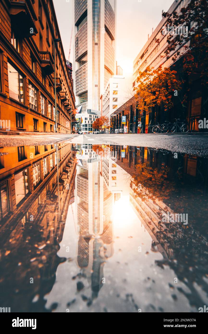 Reflection of the Commerzbank skyscraper or Commerzbank Tower at rain ...