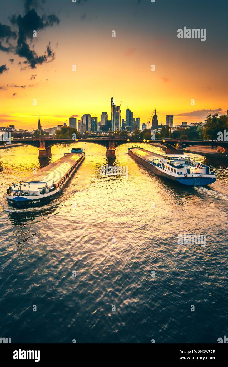 View from the Floeserbruecke over the river Main with container ships ...