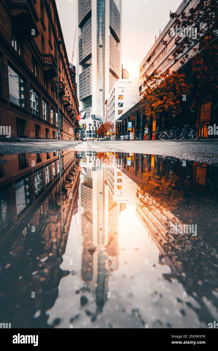Reflection of the Commerzbank skyscraper or Commerzbank Tower at rain ...
