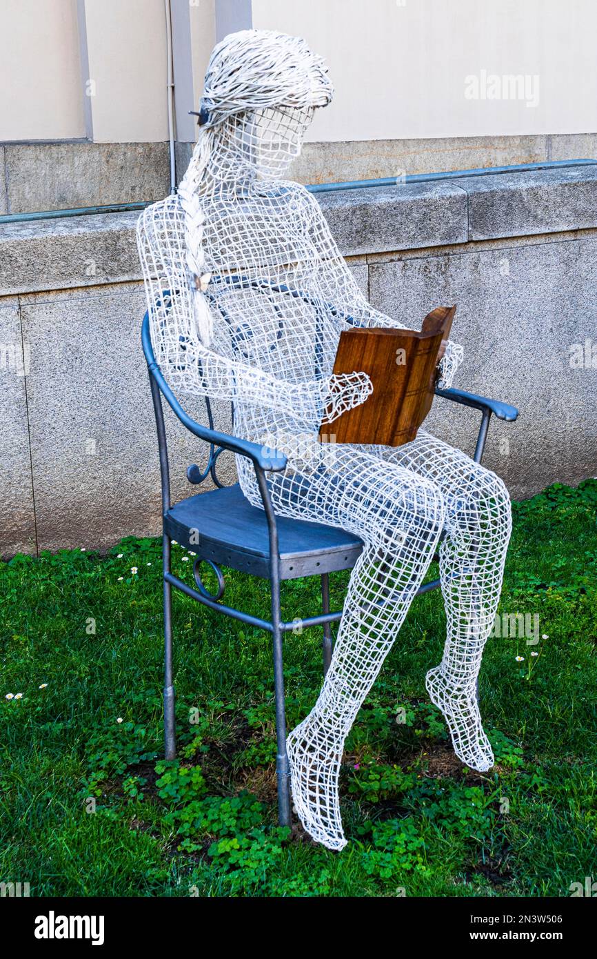Wire mesh figure, reading woman in front of the National Library ...
