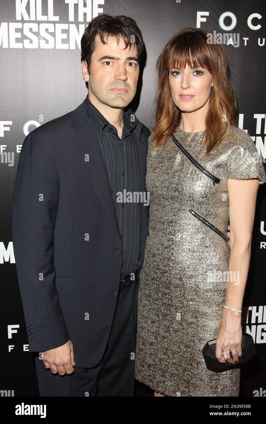 Actors Ron Livingston left and wife Rosemarie DeWitt attend the ...