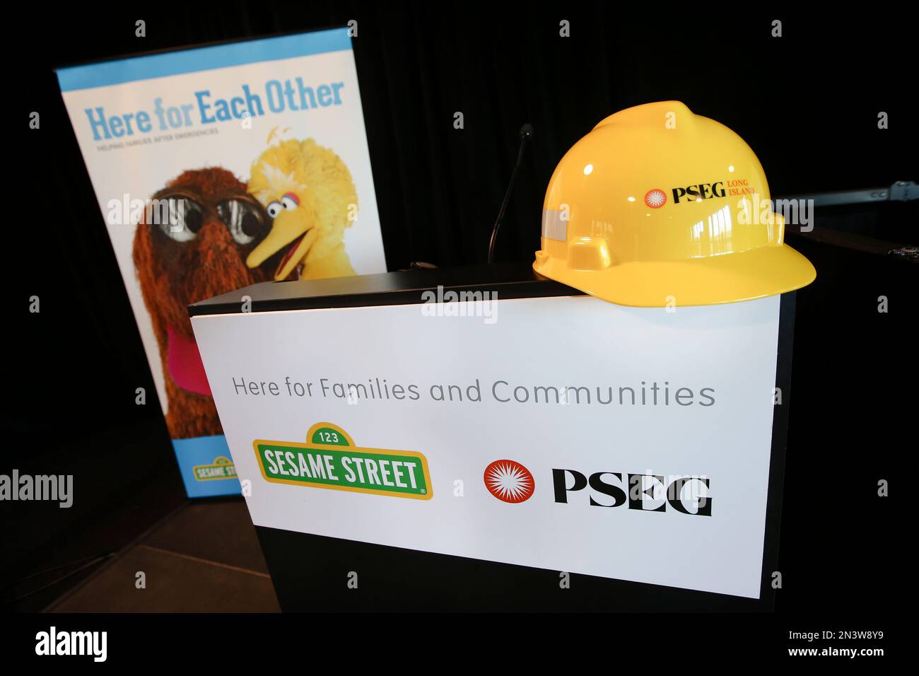 A hard hat rest on a podium before PSEG Long Island and Sesame Street ...