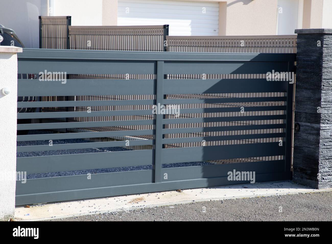 sliding gray gate steel big grey metal portal fence on modern house ...