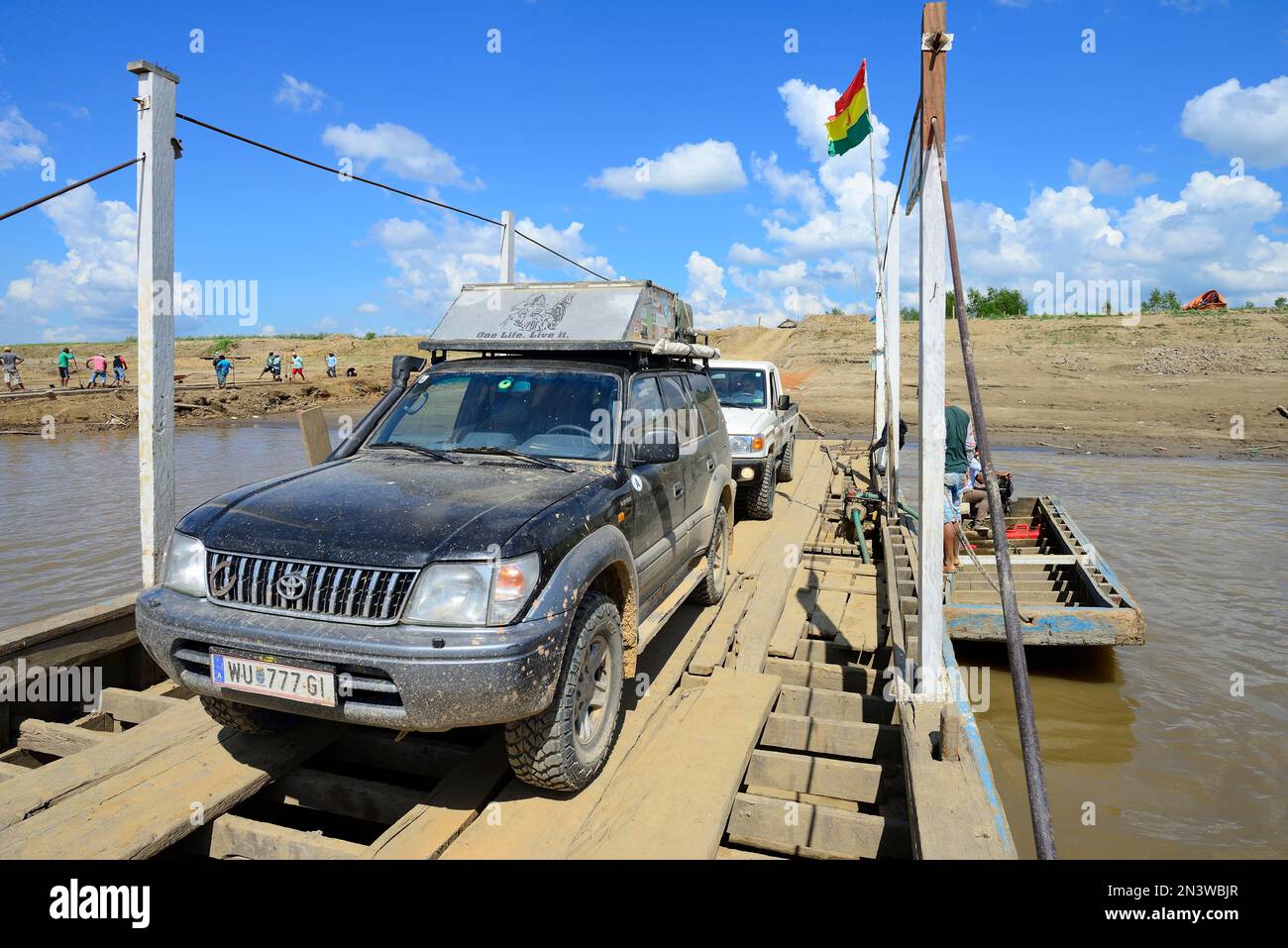 Off-road vehicle, Land Cruiser on a simple ferry across the Rio Mamore ...